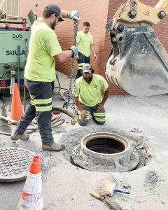 Manhole work | News, Sports, Jobs - News and Sentinel